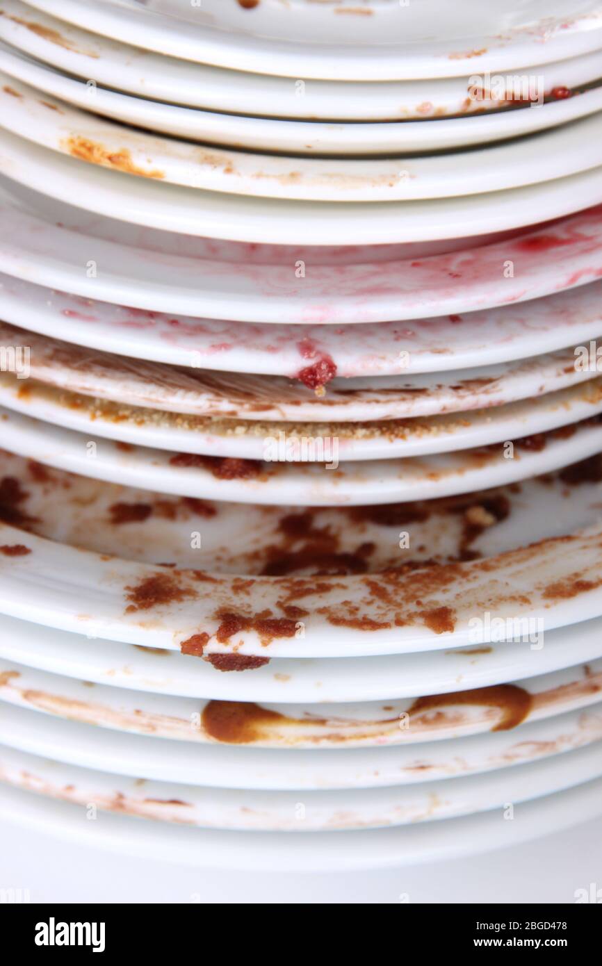 Dirty dishes isolated on white Stock Photo - Alamy