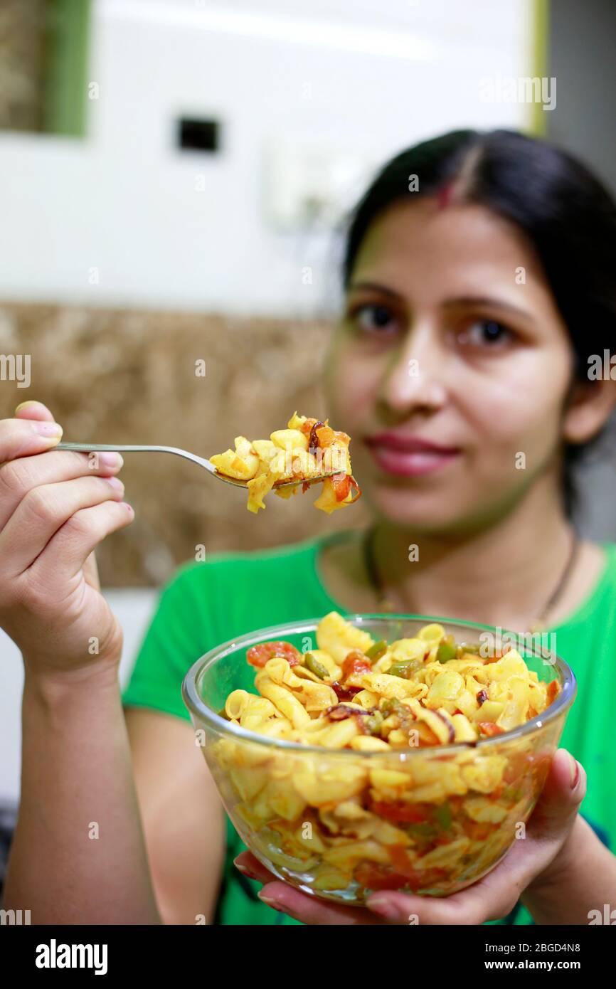 Indian person eating hi-res stock photography and images - Alamy
