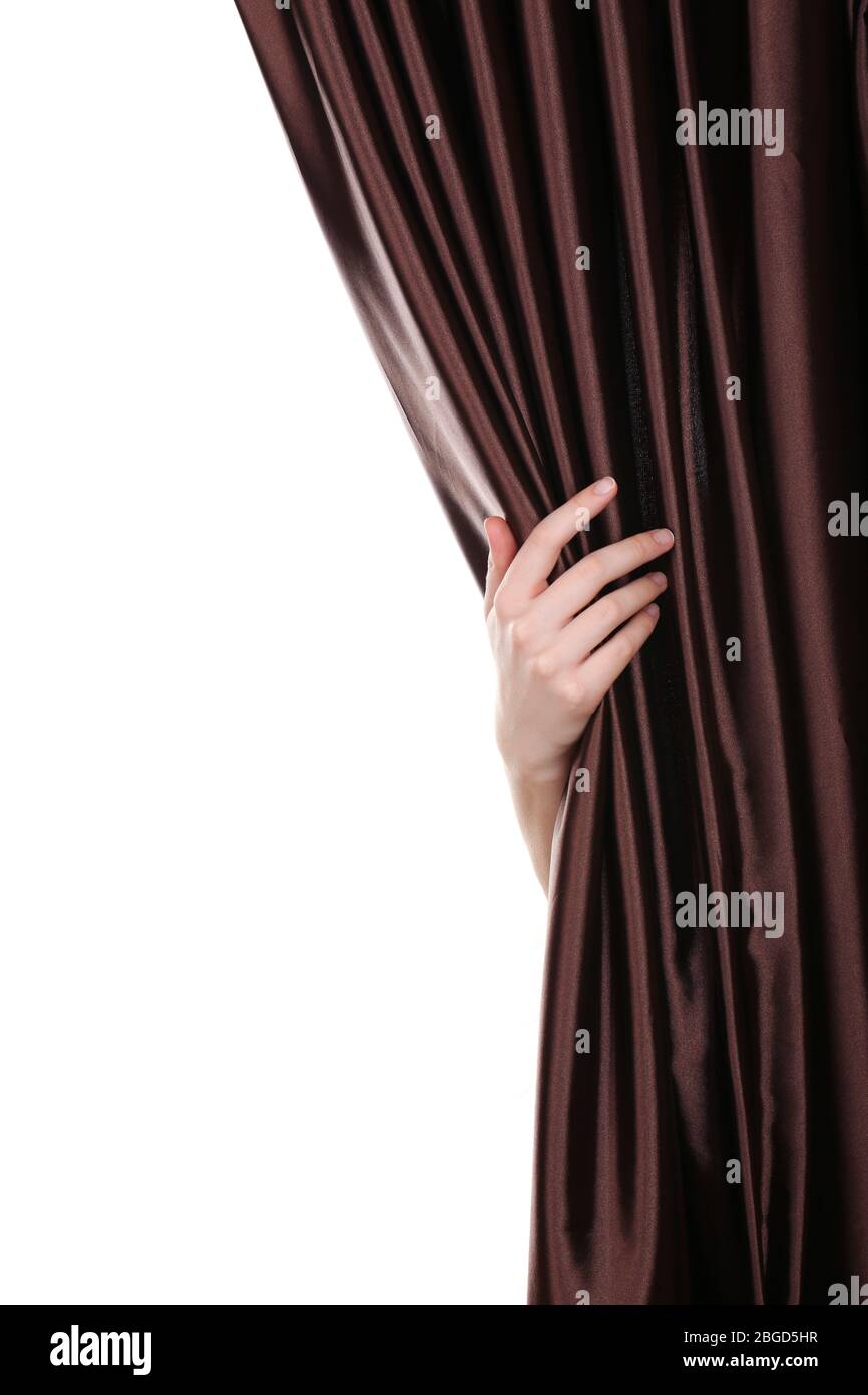 Hand opening curtain isolated on white Stock Photo - Alamy