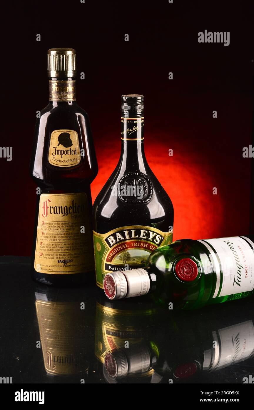 Mix of alcoholic beverage bottles on studio shot Stock Photo - Alamy