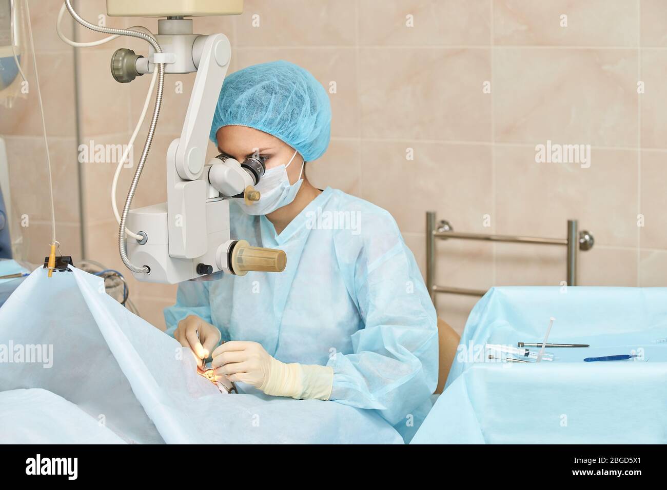 Ophthalmology laser microscope operation. Doctor in clinic. Patient eye ...