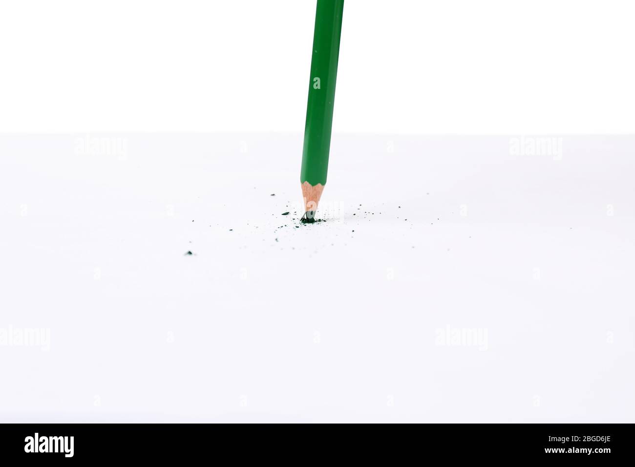 Breaking pencil, isolated on white Stock Photo - Alamy