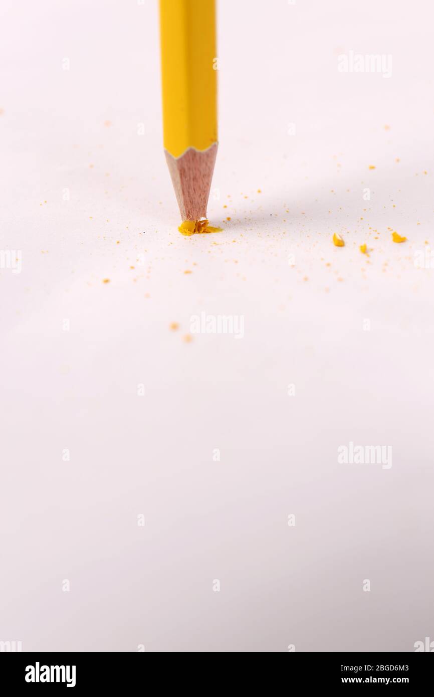 Breaking pencil, isolated on white Stock Photo - Alamy