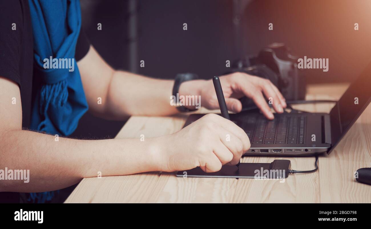 Photographer hands using digital devices Stock Photo - Alamy