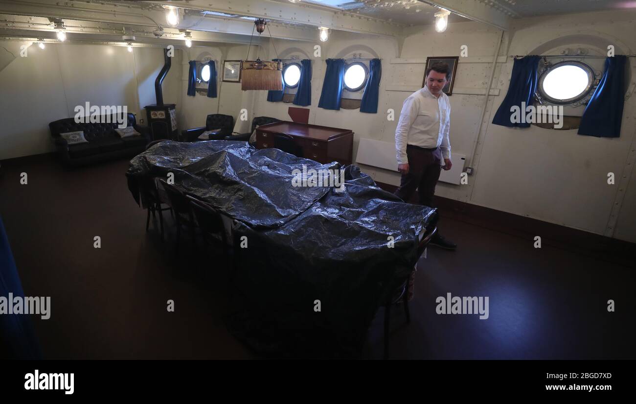 Manager Ben Robson checks on the officers' mess aboard the HMS Caroline ...