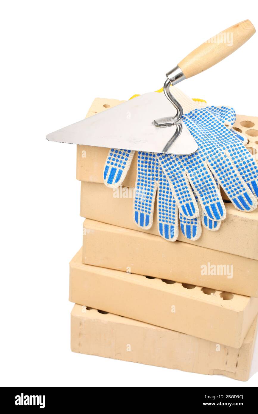 New bricks and building tools, isolated on white Stock Photo - Alamy