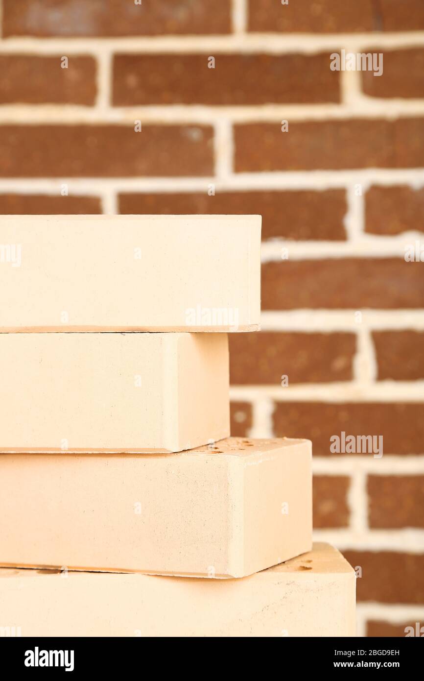 New bricks on brick wall background Stock Photo - Alamy