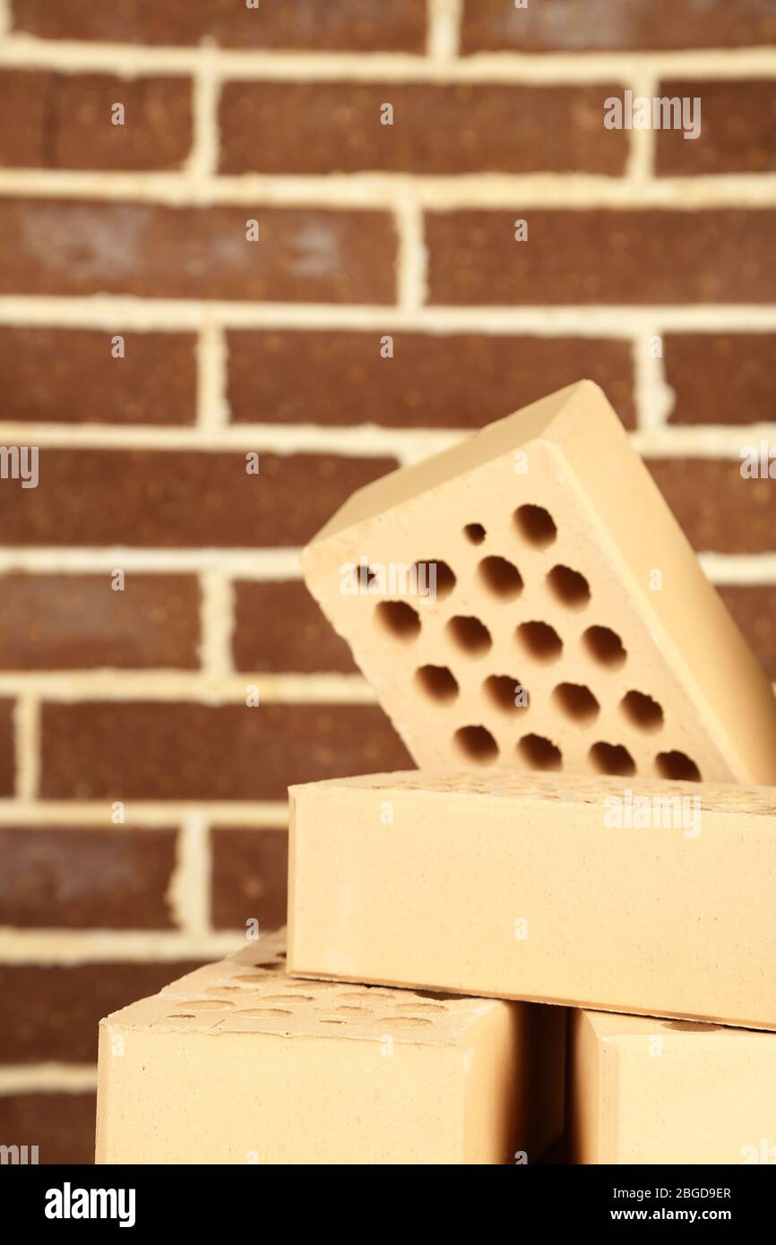 New bricks on brick wall background Stock Photo - Alamy