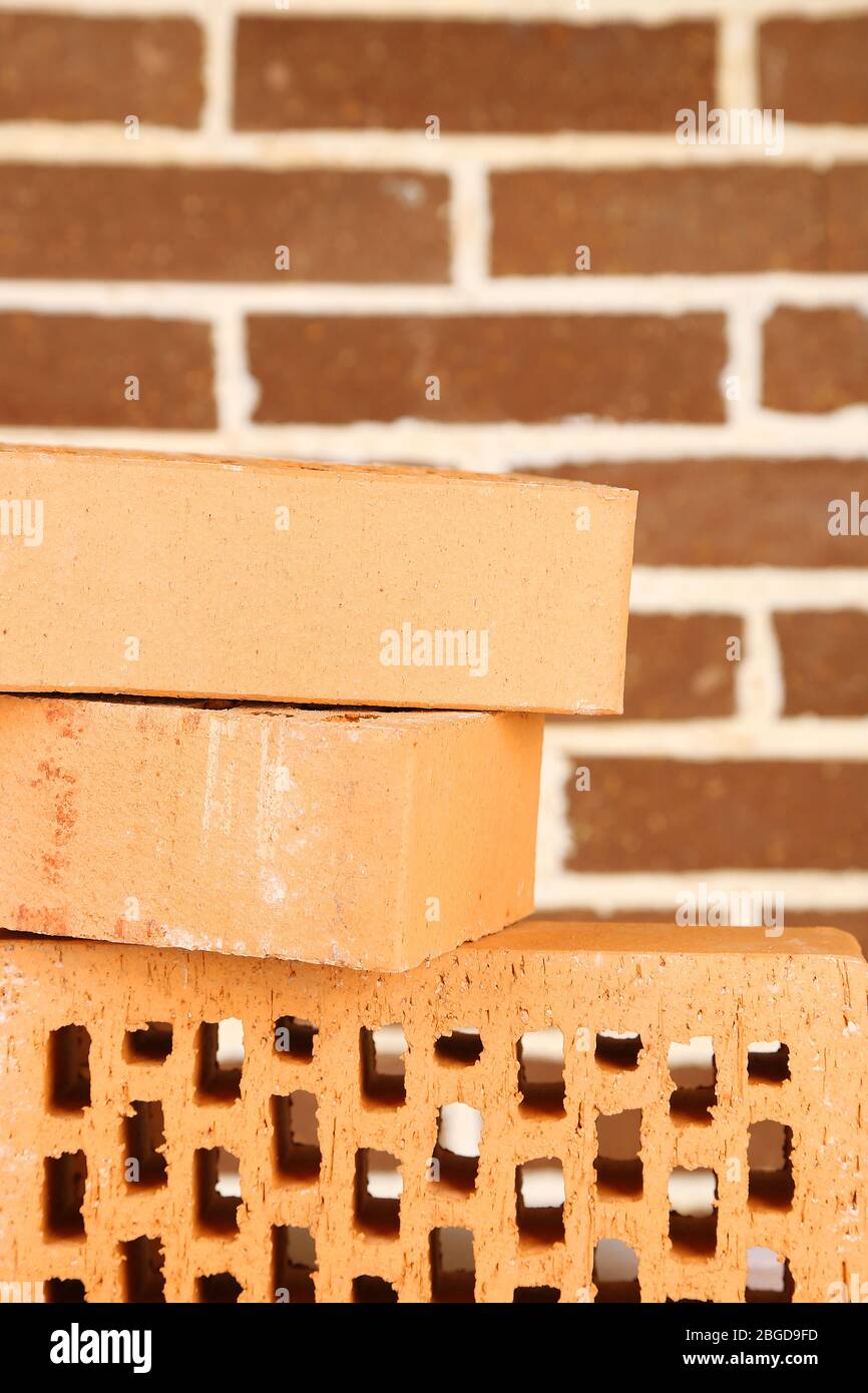 New bricks on brick wall background Stock Photo - Alamy