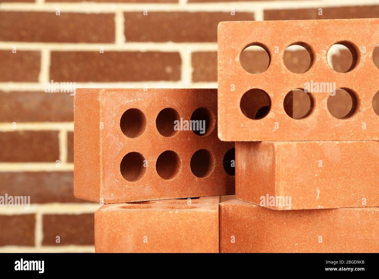 New bricks on brick wall background Stock Photo - Alamy