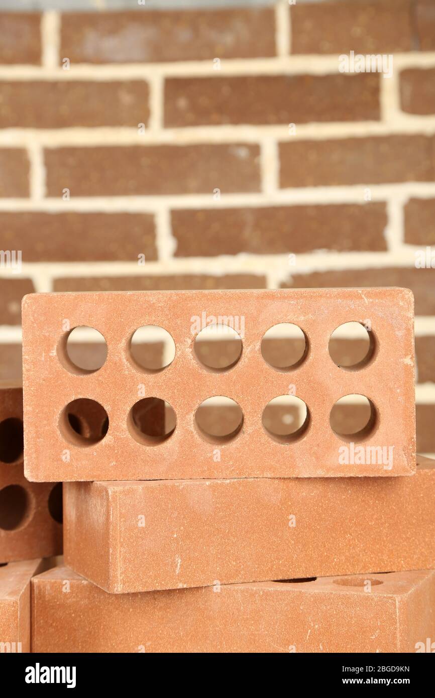 New bricks on brick wall background Stock Photo - Alamy