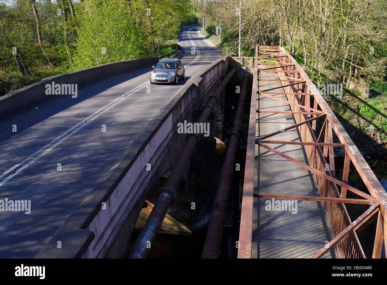 Car over a hump back bridge hi-res stock photography and images - Alamy