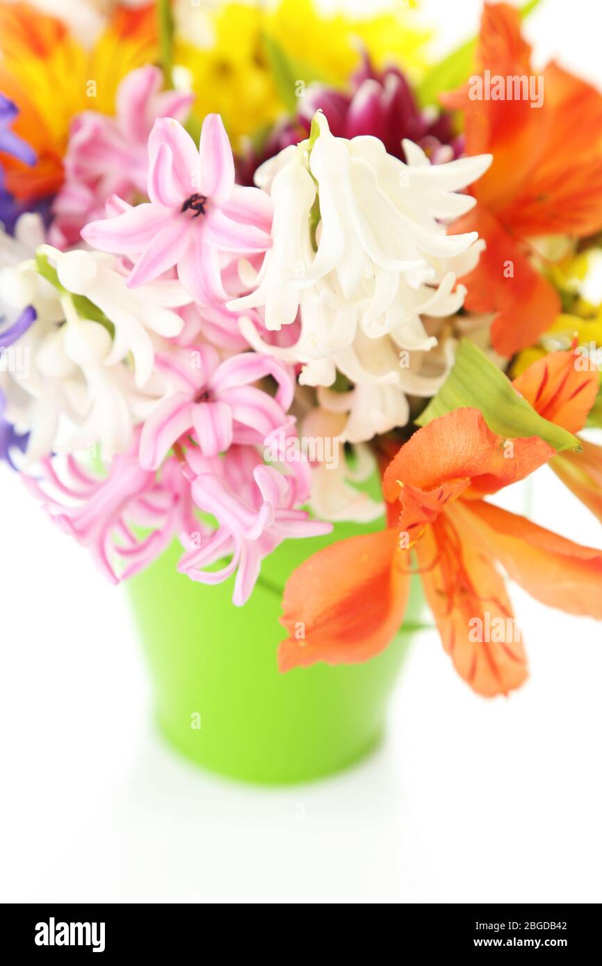 Beautiful flowers in metal bucket isolated on white Stock Photo - Alamy