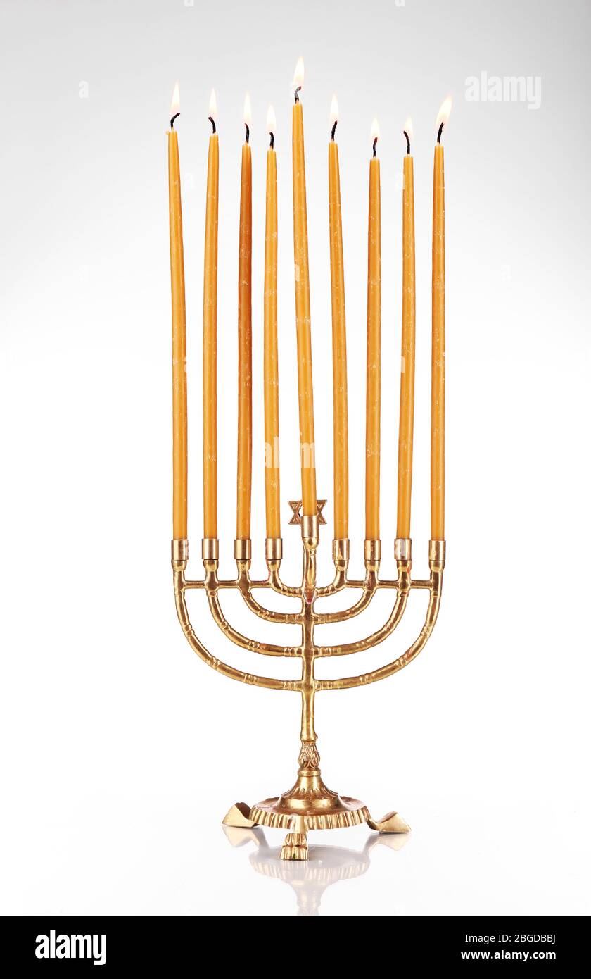 Hanukkah menorah with candles isolated on white Stock Photo - Alamy