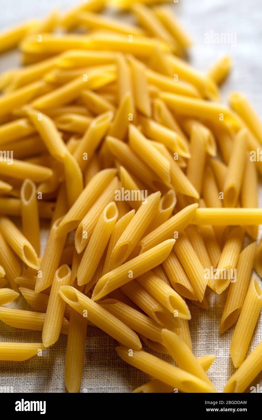 Italian uncooked dry pasta Penne rigate Stock Photo - Alamy