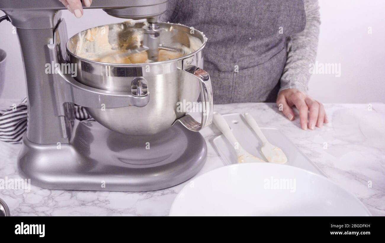 Mixing ingredients making funfetti cake hi-res stock photography and ...