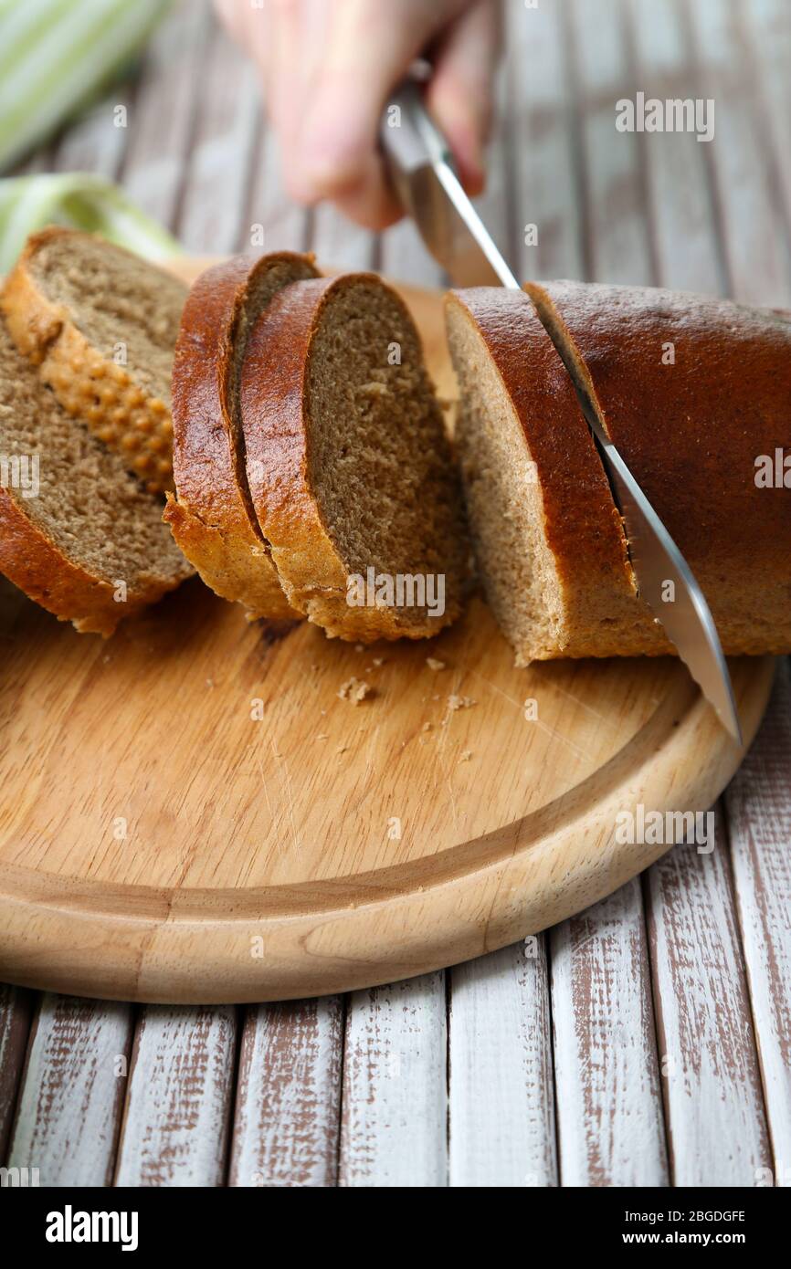 Women hands cutting bakery hi-res stock photography and images - Alamy