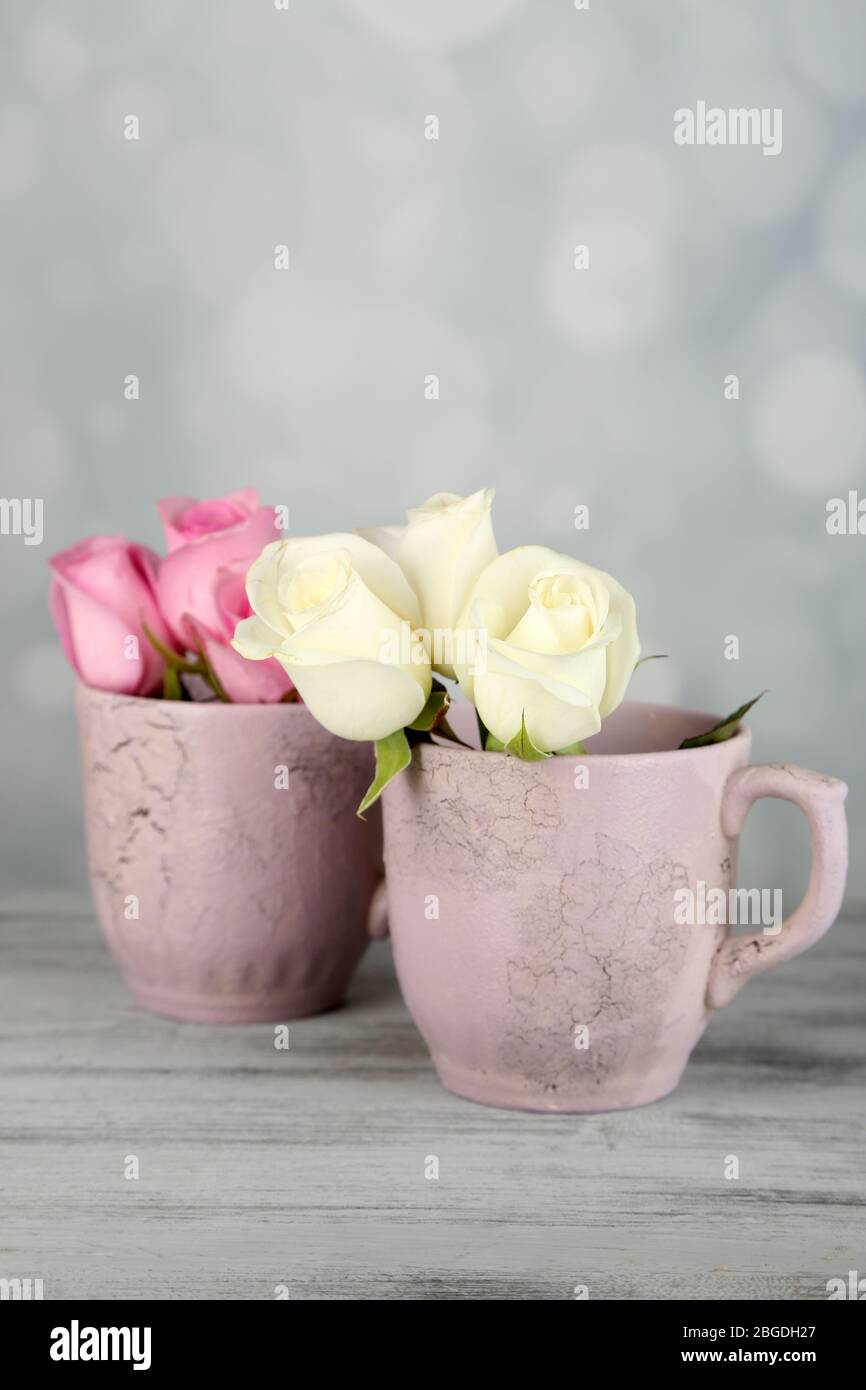 Beautiful roses in cups hi-res stock photography and images - Alamy