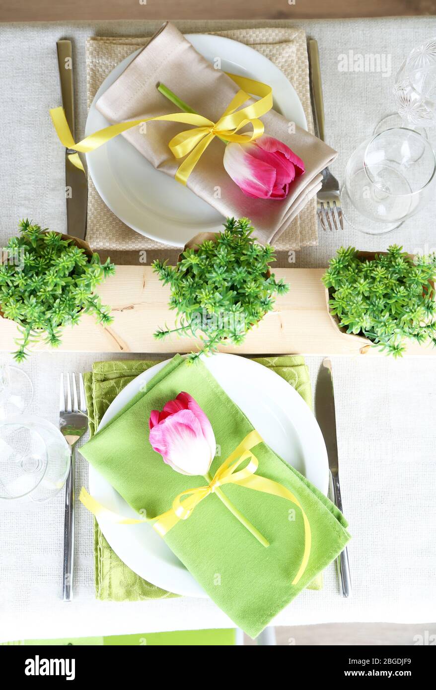 Beautiful spring table setting on bright background Stock Photo - Alamy