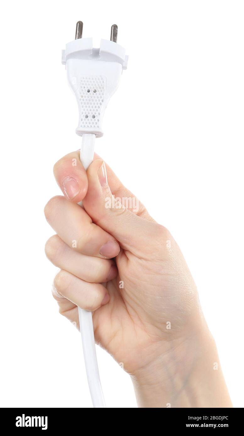 Hand holding electric plug isolated on white Stock Photo - Alamy