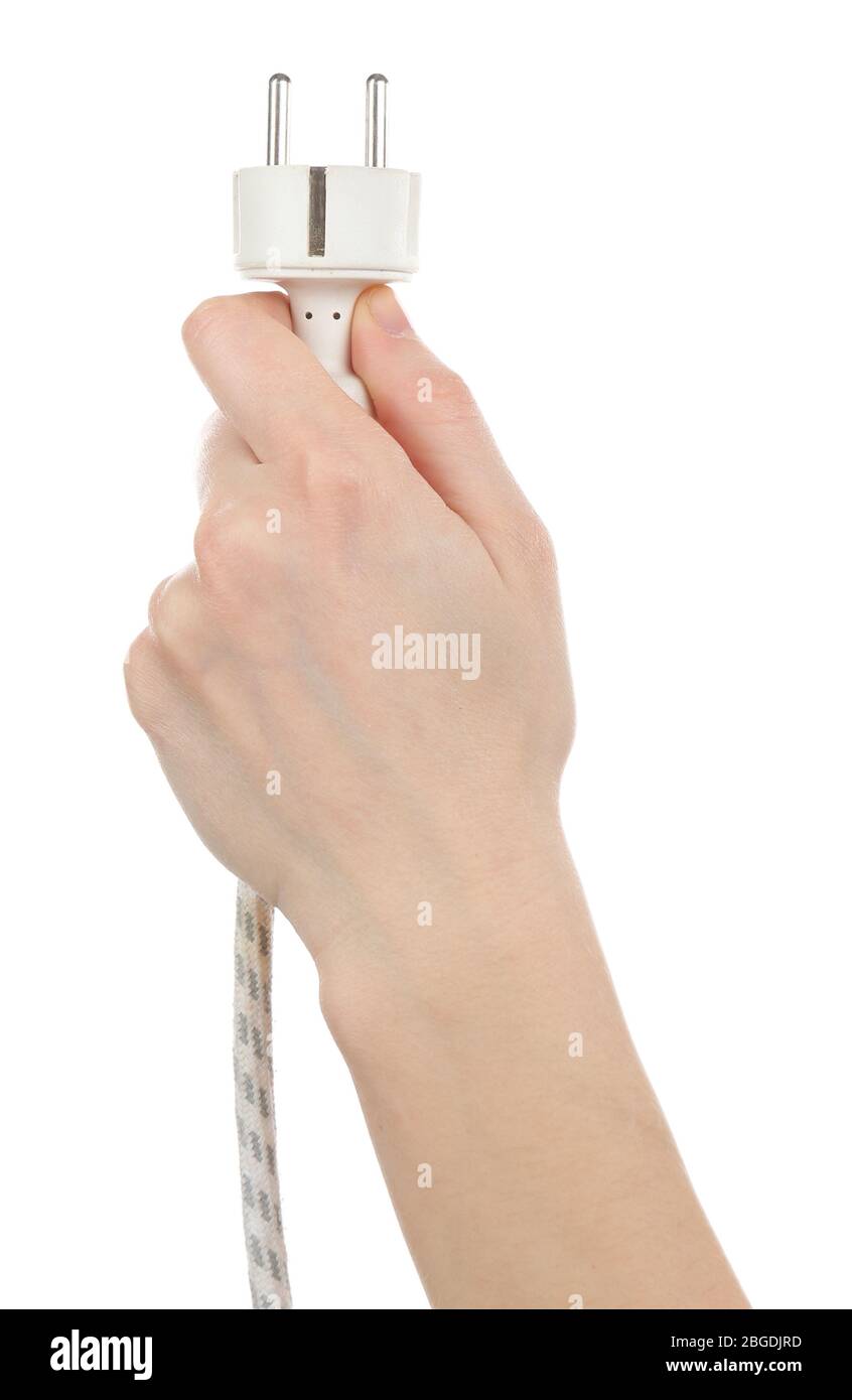 Hand holding electric plug isolated on white Stock Photo - Alamy