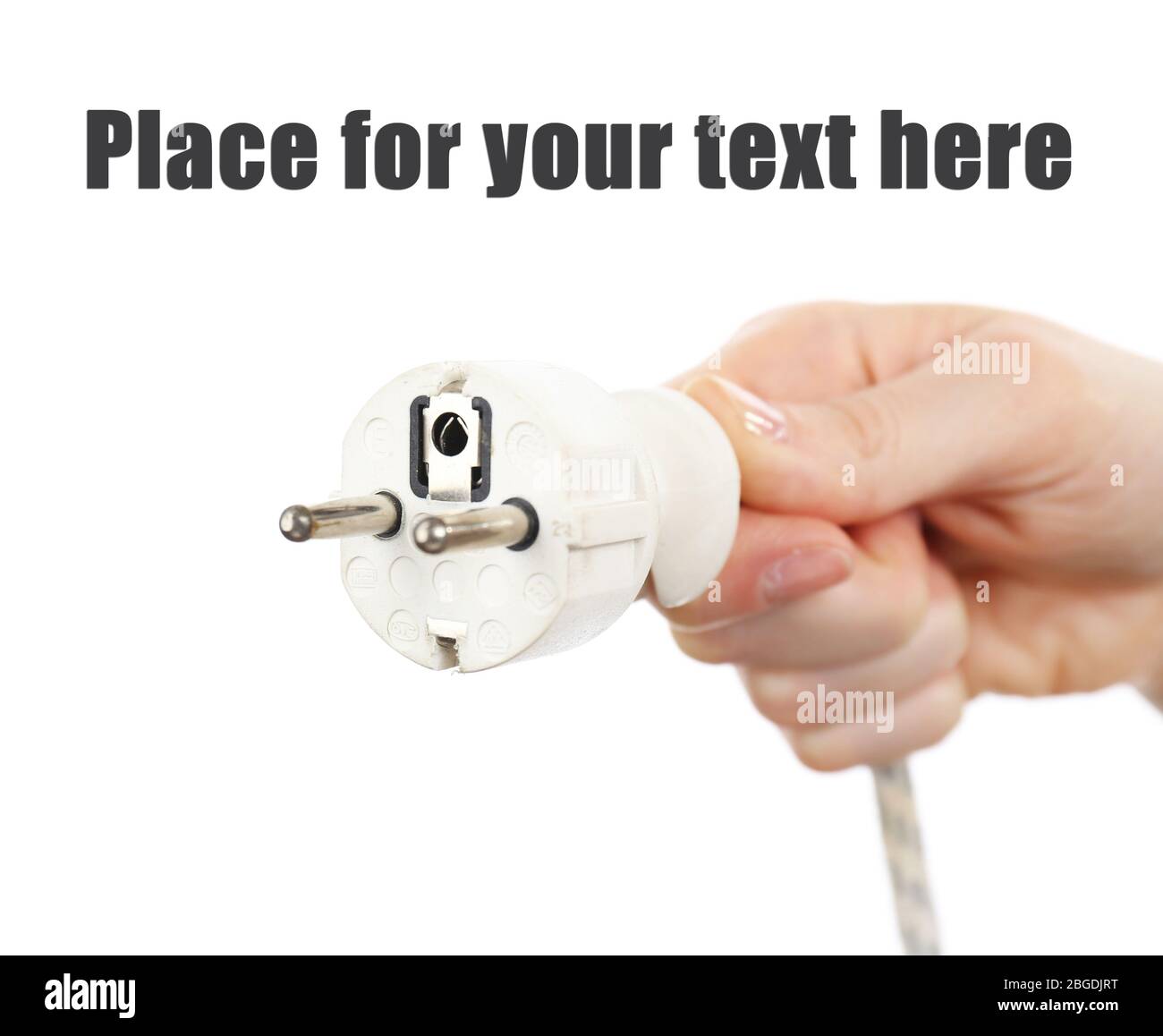 Hand holding electric plug isolated on white Stock Photo - Alamy