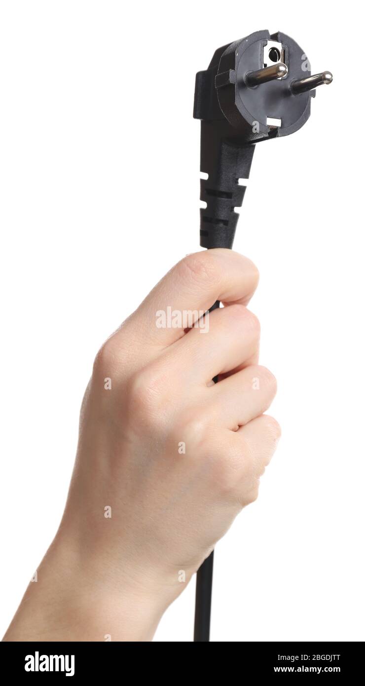 Hand holding electric plug isolated on white Stock Photo - Alamy