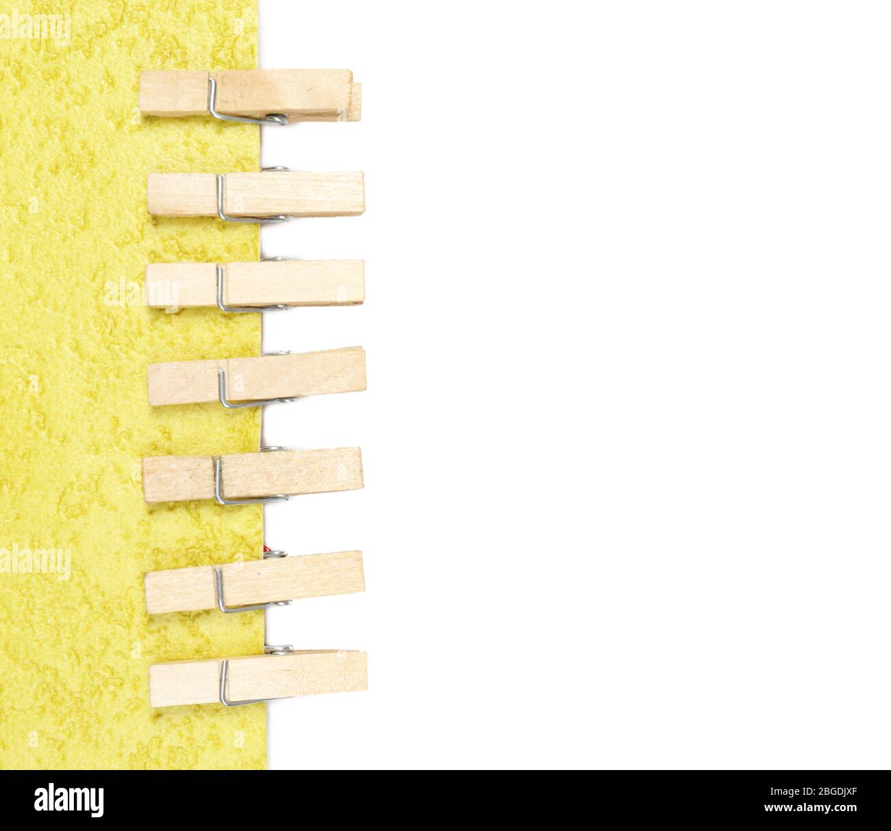 Colorful wooden pins with paper, isolated on white Stock Photo - Alamy