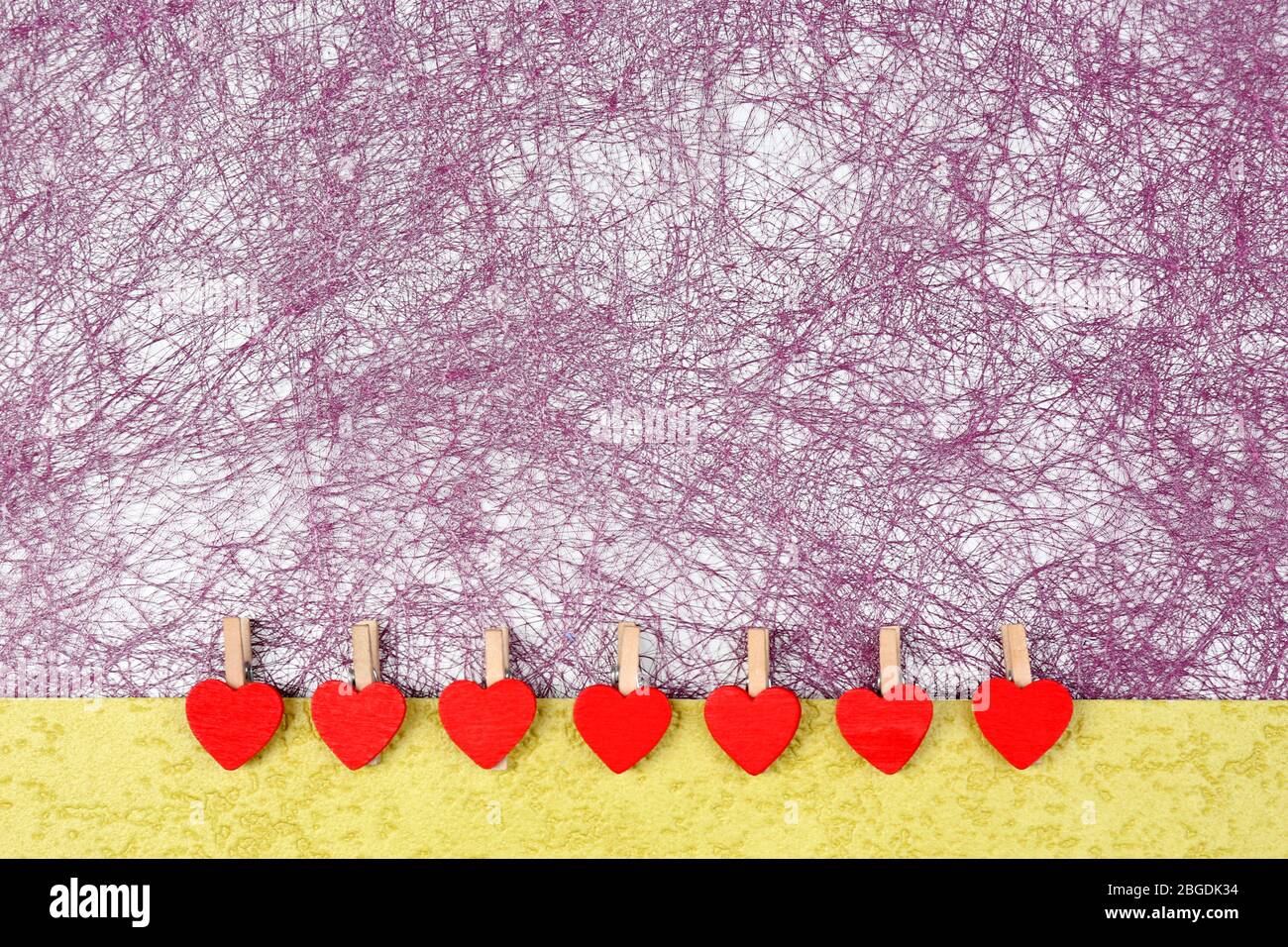 Abstract background with colorful wooden pins and paper Stock Photo - Alamy