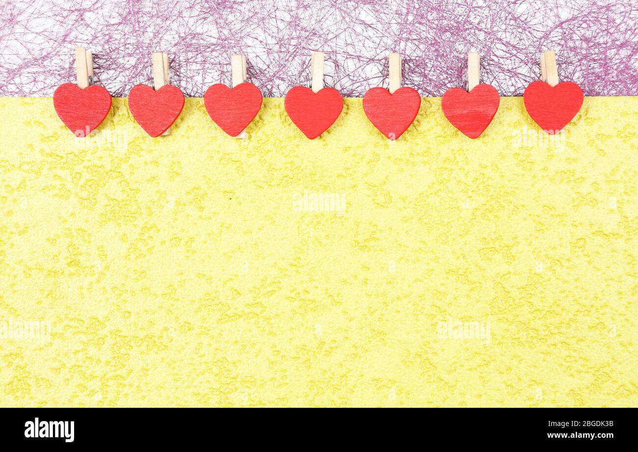 Abstract background with colorful wooden pins and paper Stock Photo - Alamy