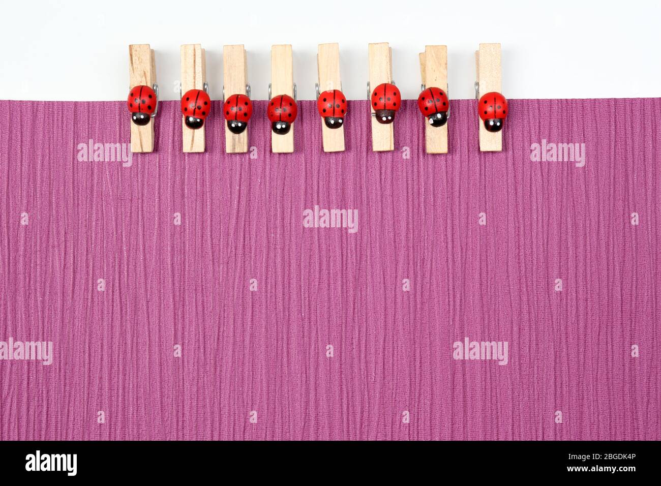 Abstract background with colorful wooden pins and paper Stock Photo - Alamy
