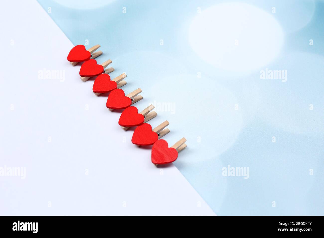 Abstract background with colorful wooden pins and paper Stock Photo - Alamy