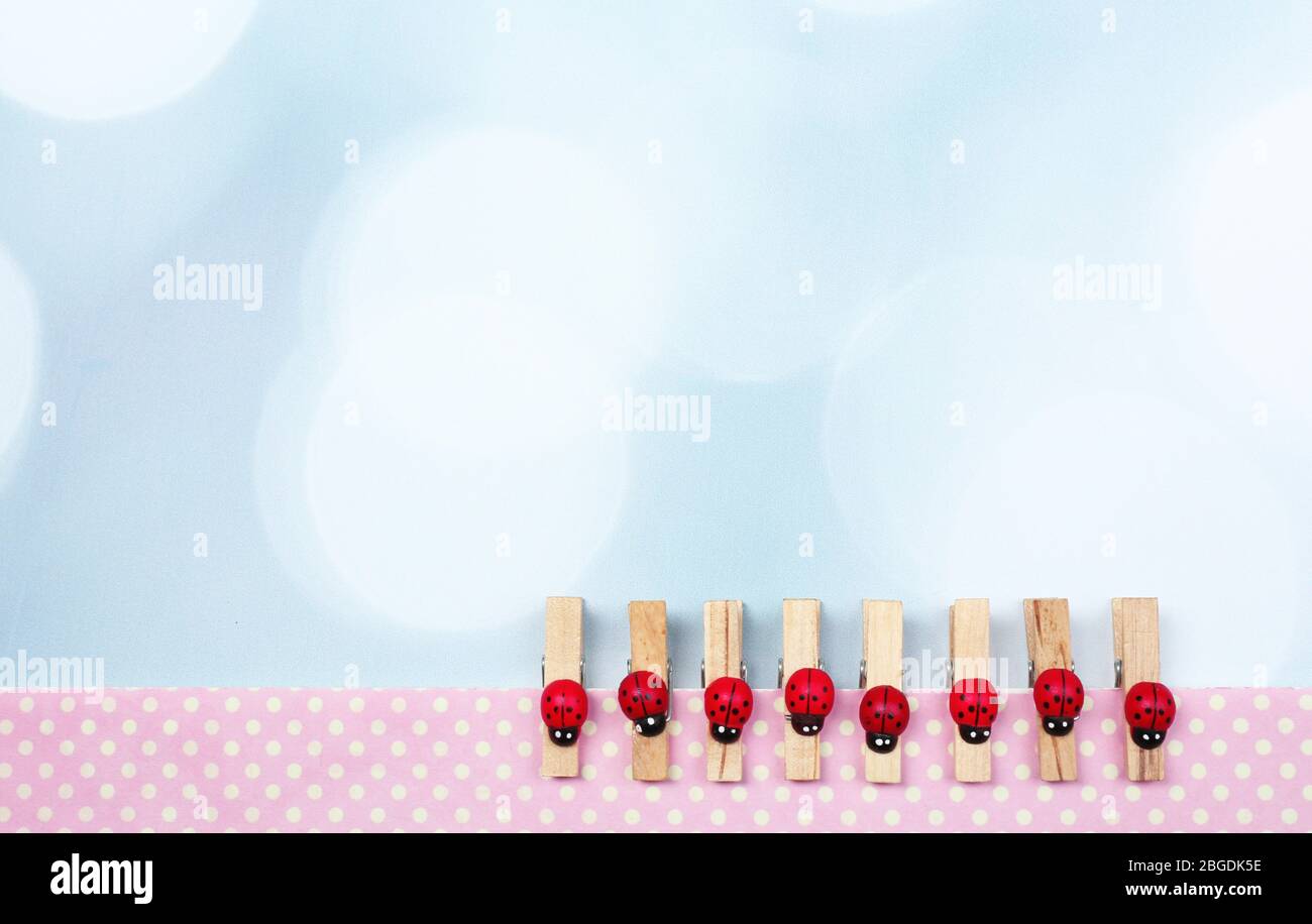 Abstract background with colorful wooden pins and paper Stock Photo - Alamy