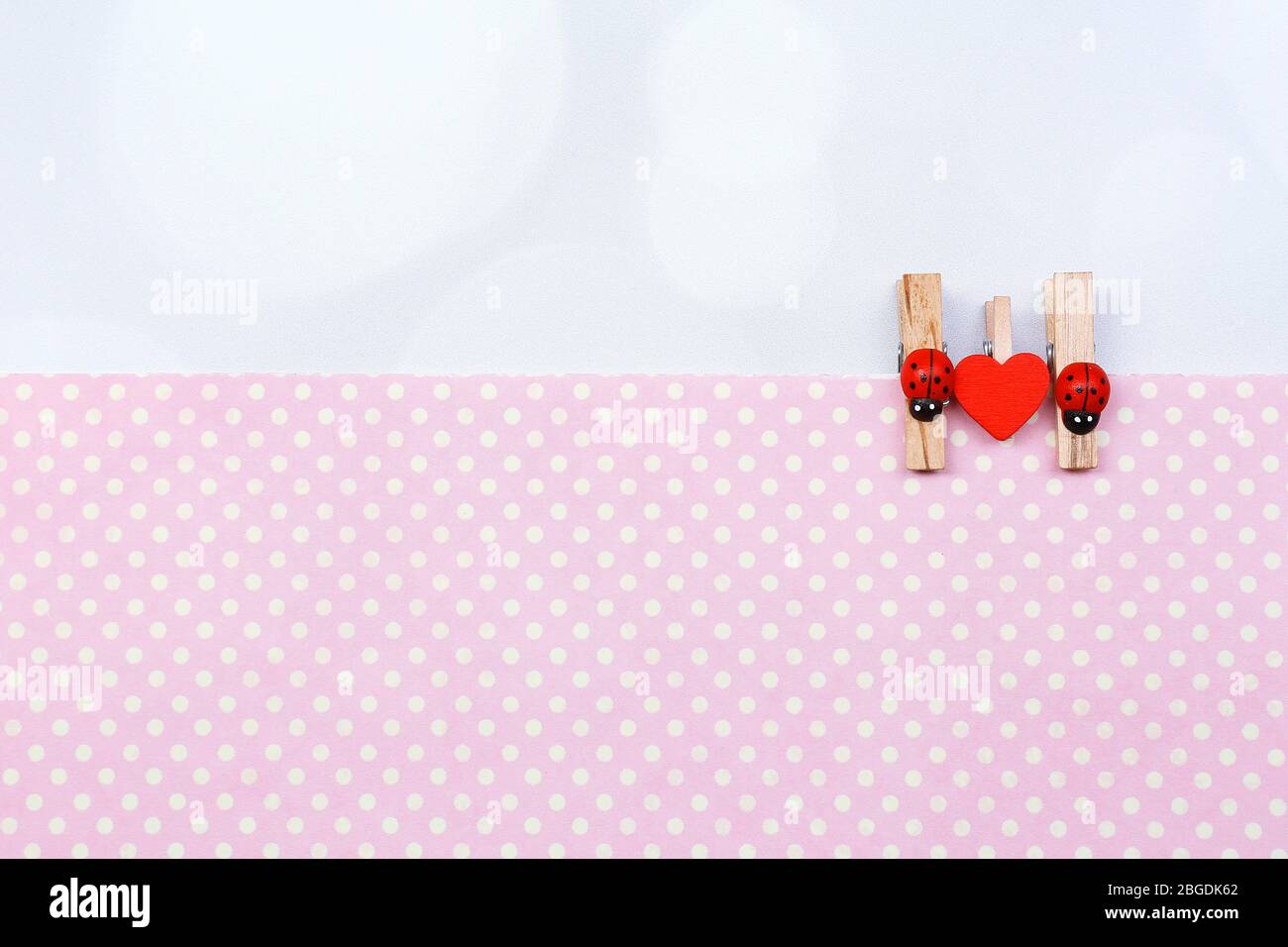 Abstract background with colorful wooden pins and paper Stock Photo - Alamy