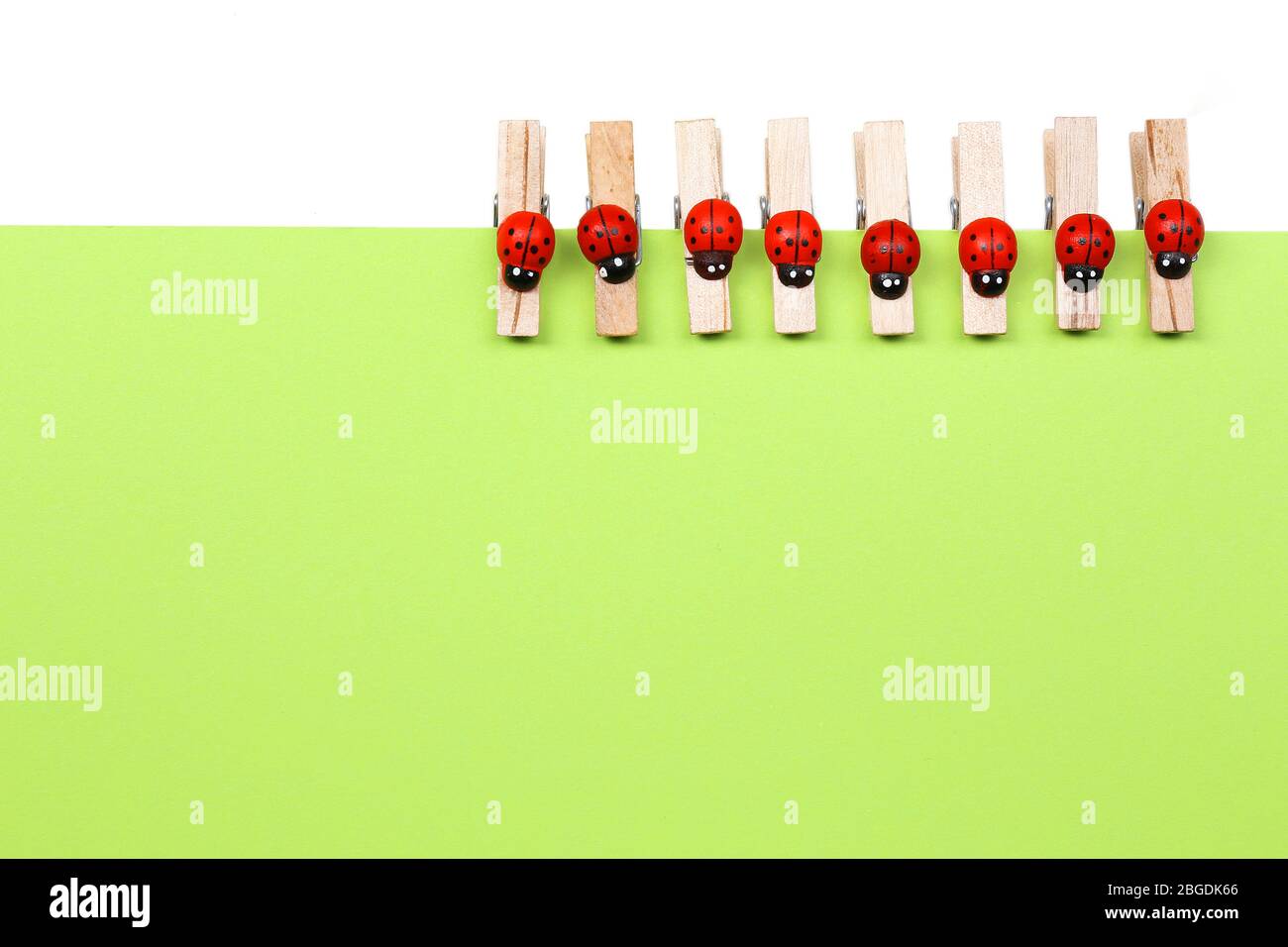 Abstract background with colorful wooden pins and paper Stock Photo - Alamy