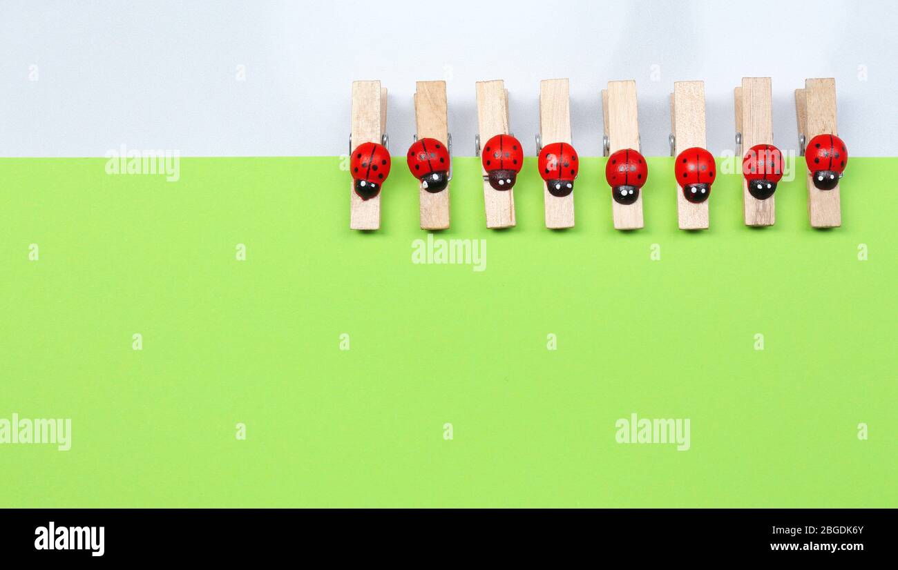 Abstract background with colorful wooden pins and paper Stock Photo - Alamy