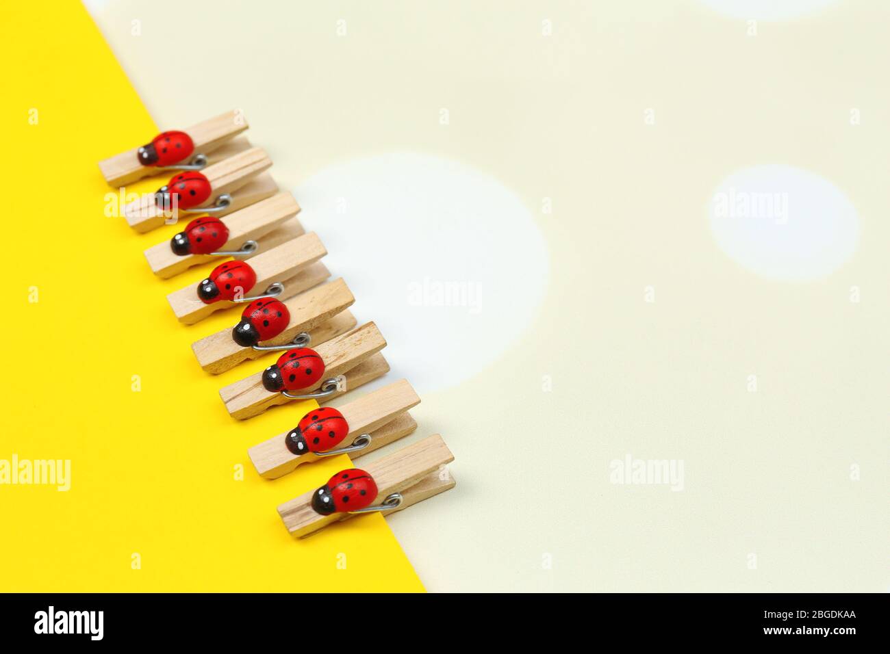 Abstract background with colorful wooden pins and paper Stock Photo - Alamy