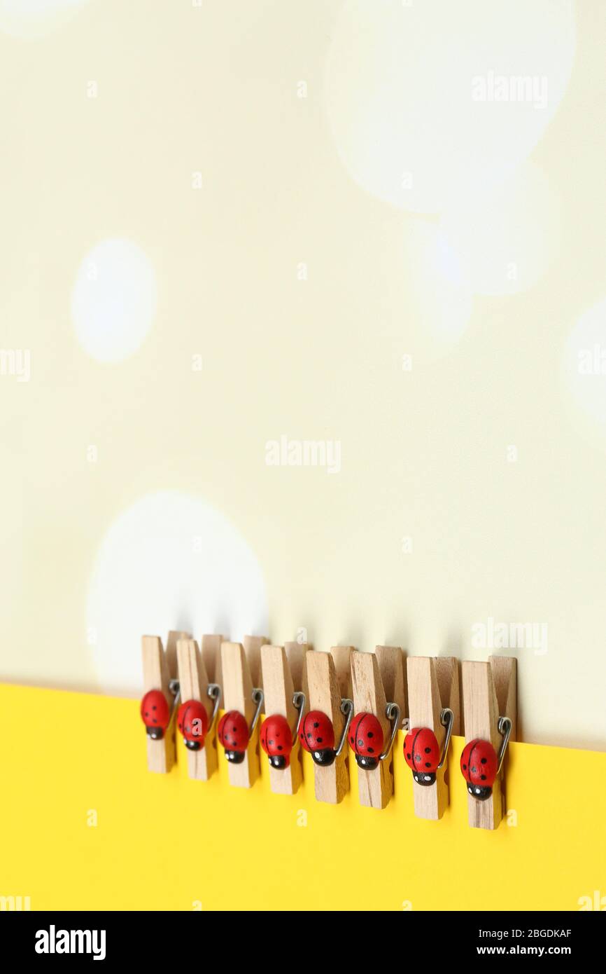 Abstract background with colorful wooden pins and paper Stock Photo - Alamy