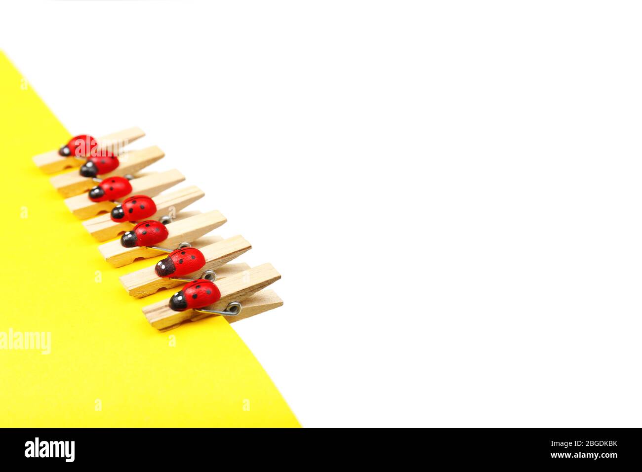 Abstract background with colorful wooden pins and paper Stock Photo - Alamy