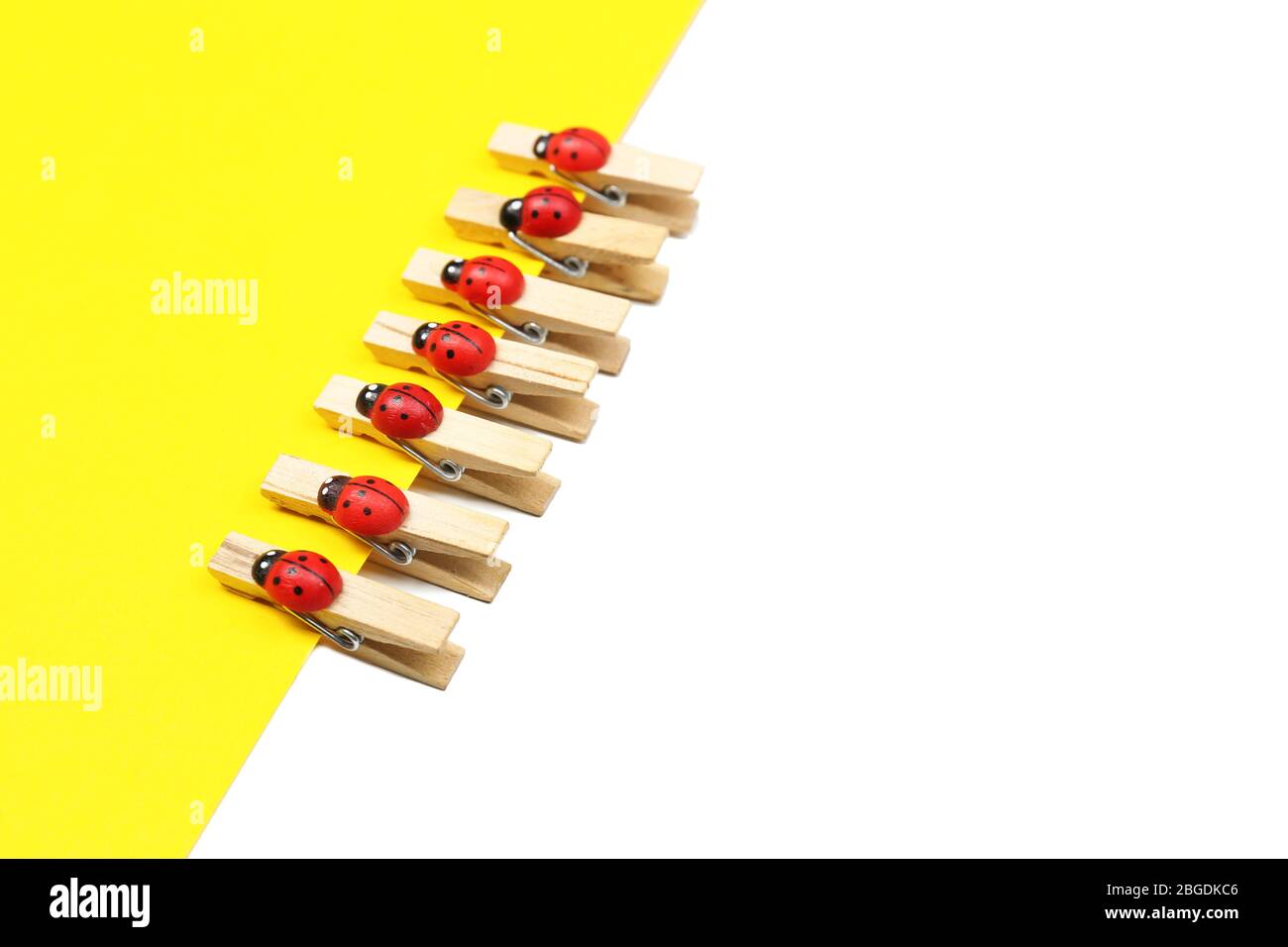 Abstract background with colorful wooden pins and paper Stock Photo - Alamy