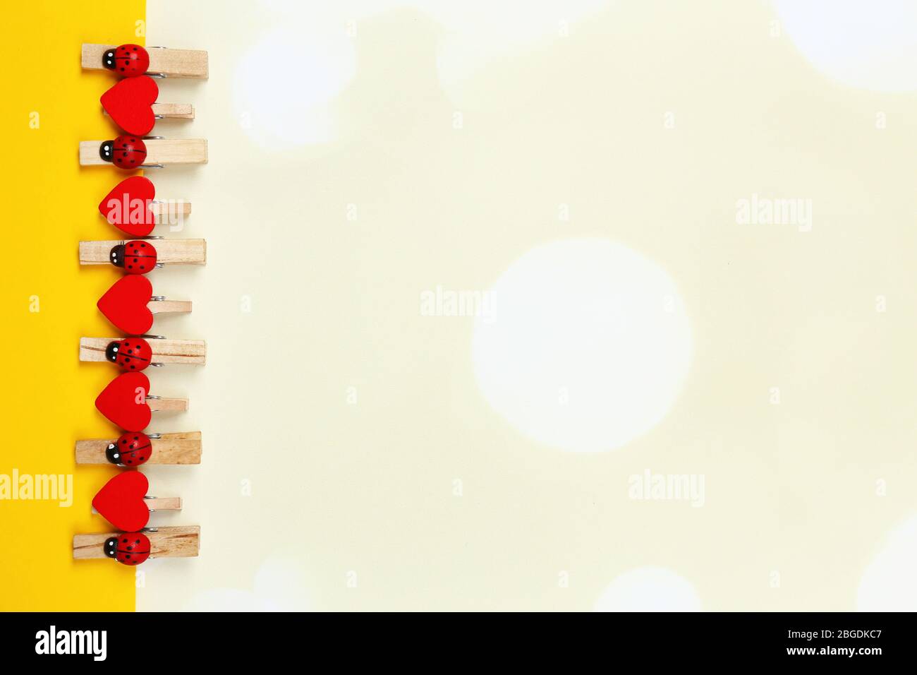 Abstract background with colorful wooden pins and paper Stock Photo - Alamy