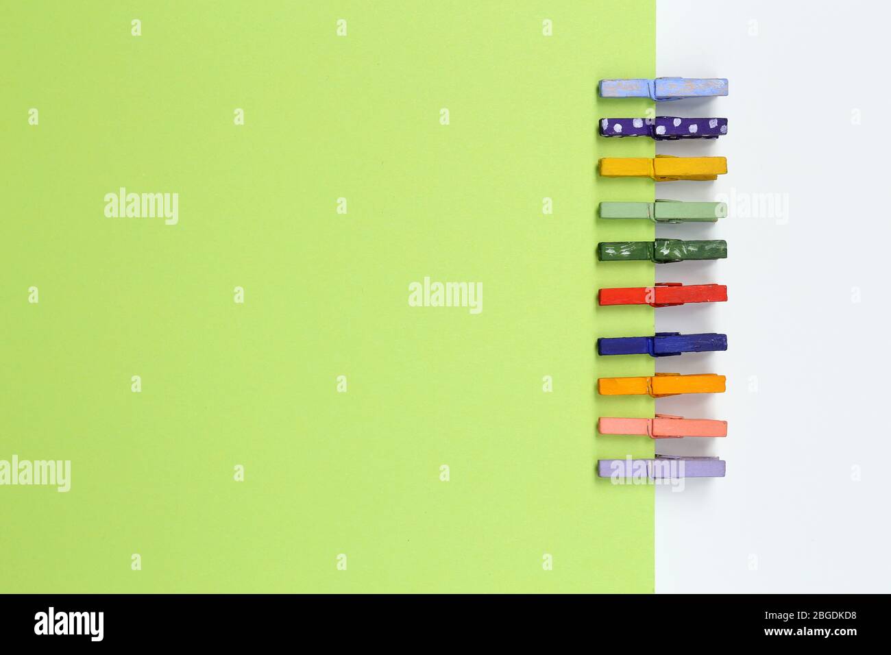 Abstract background with colorful wooden pins and paper Stock Photo - Alamy