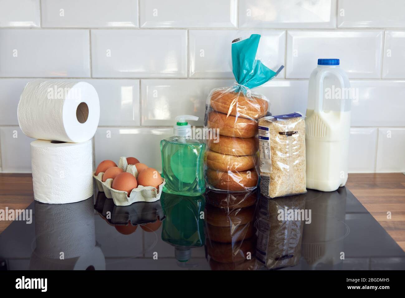 Essential food shop on kitchen counter Stock Photo - Alamy