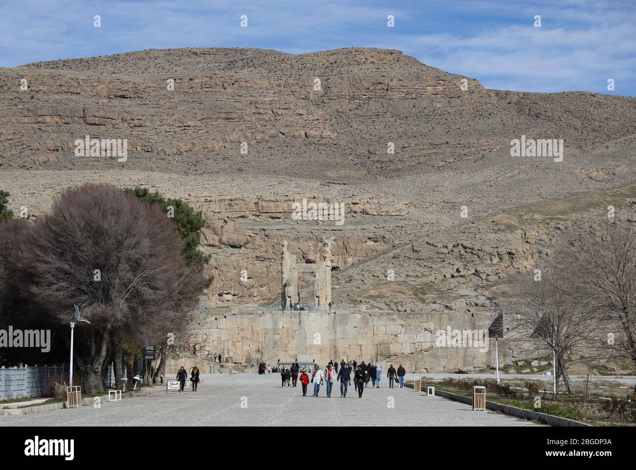 Tourists walking towards the to Gate of All Nation (Xerxes Gate ...