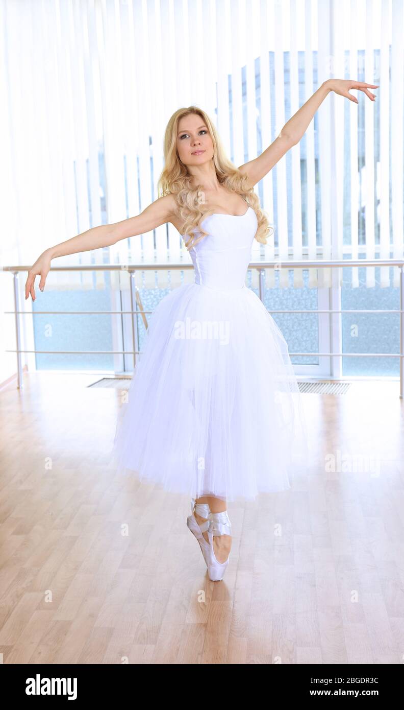 Beautiful balerina dancing in ballet class Stock Photo - Alamy