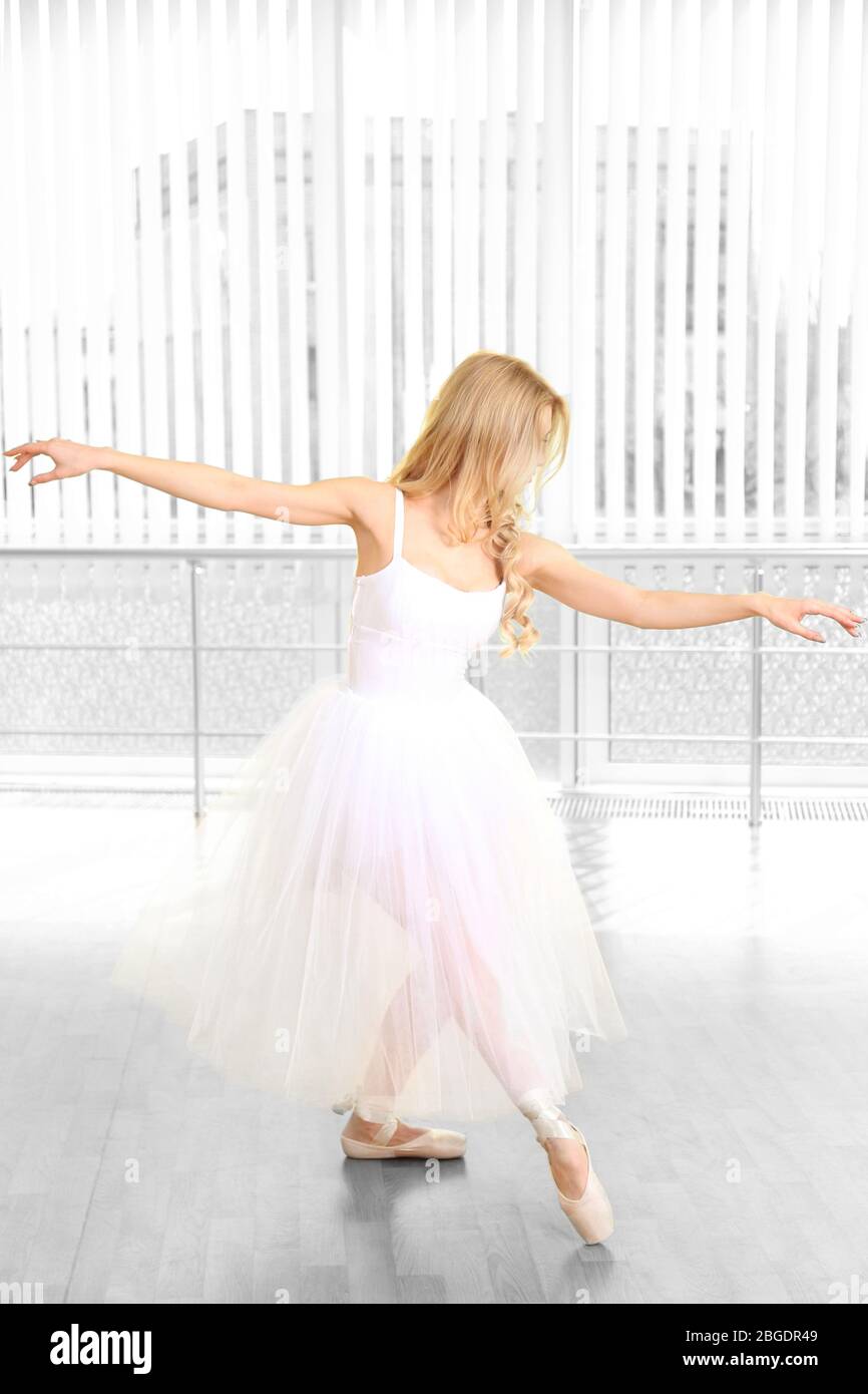 Beautiful balerina dancing in ballet class Stock Photo - Alamy