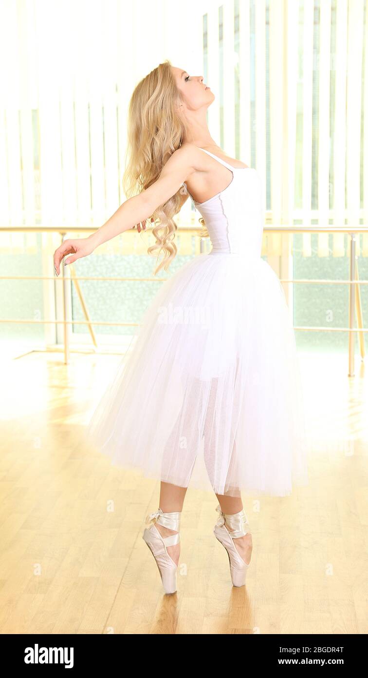 Beautiful balerina dancing in ballet class Stock Photo - Alamy