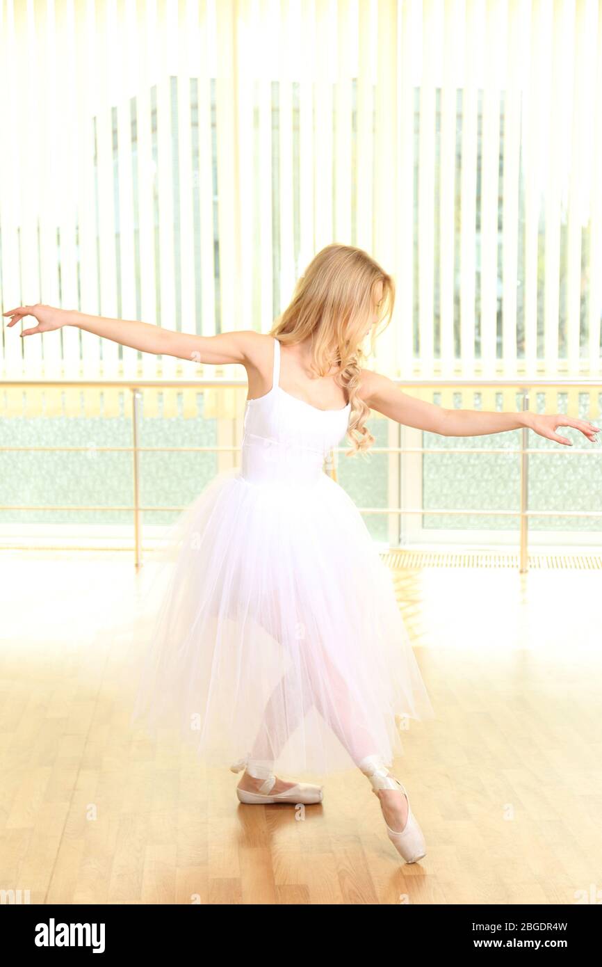 Beautiful balerina dancing in ballet class Stock Photo - Alamy