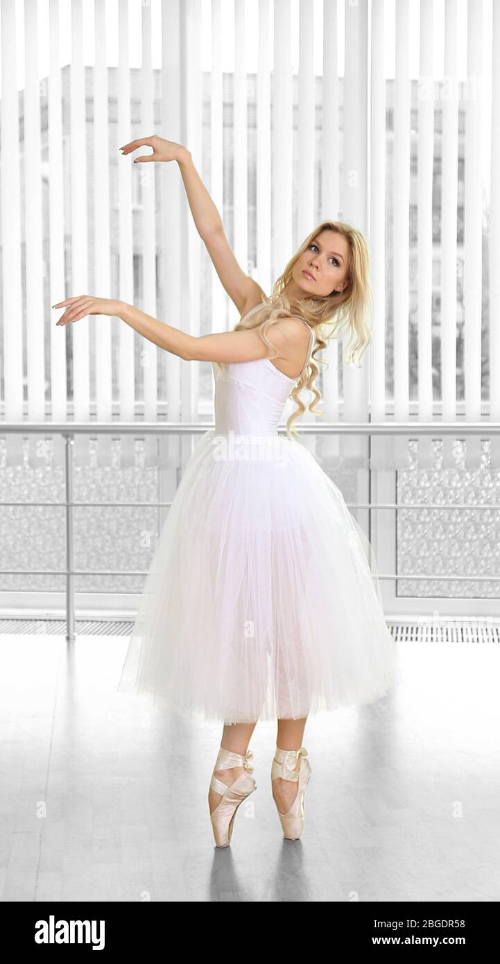 Beautiful balerina dancing in ballet class Stock Photo - Alamy