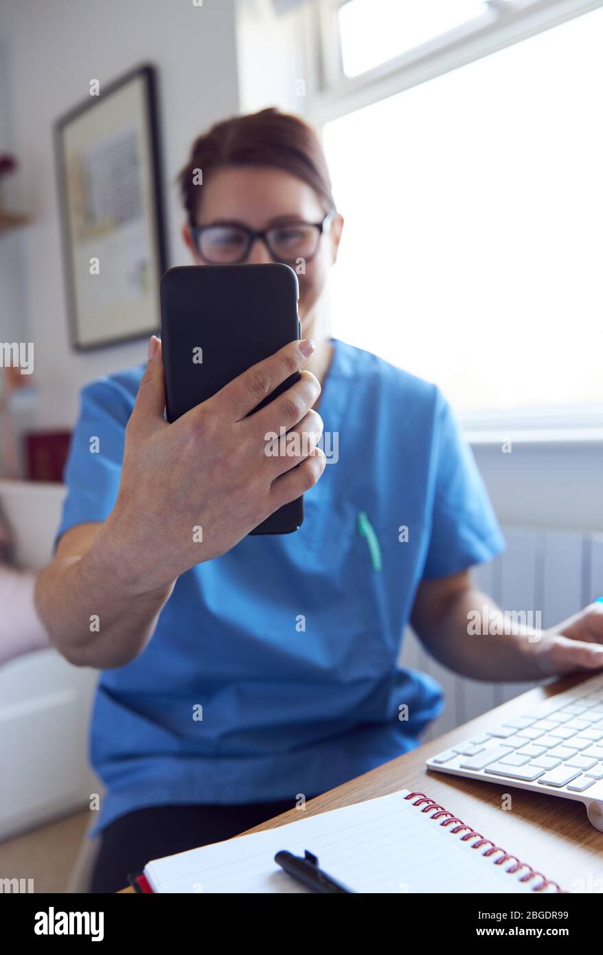 Telemedicine concept, virtual nurse using mobile phone happy and ...